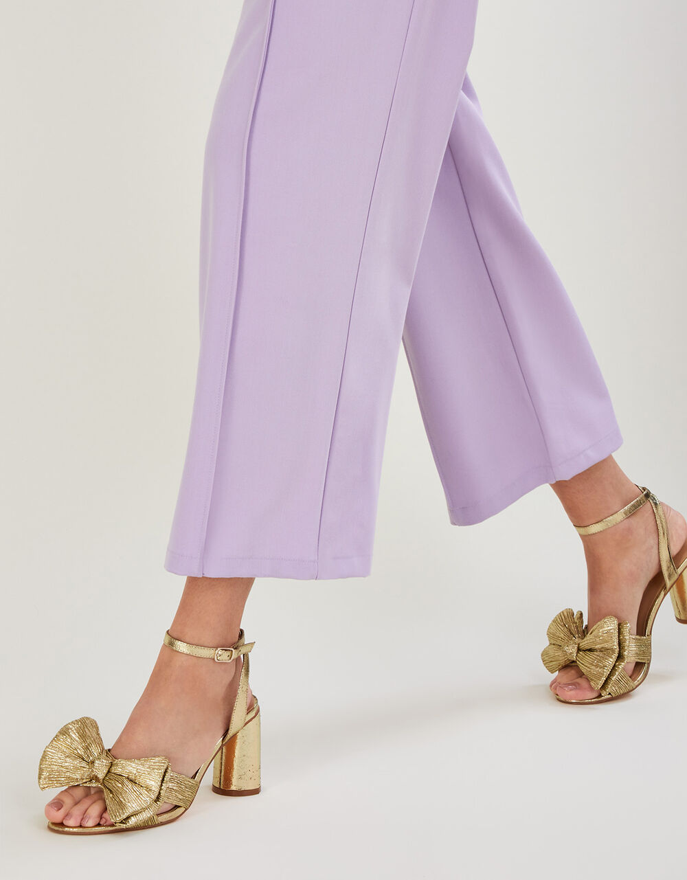 Metallic Bow Block Heel Sandals Gold | Occasion Shoes | Monsoon UK.