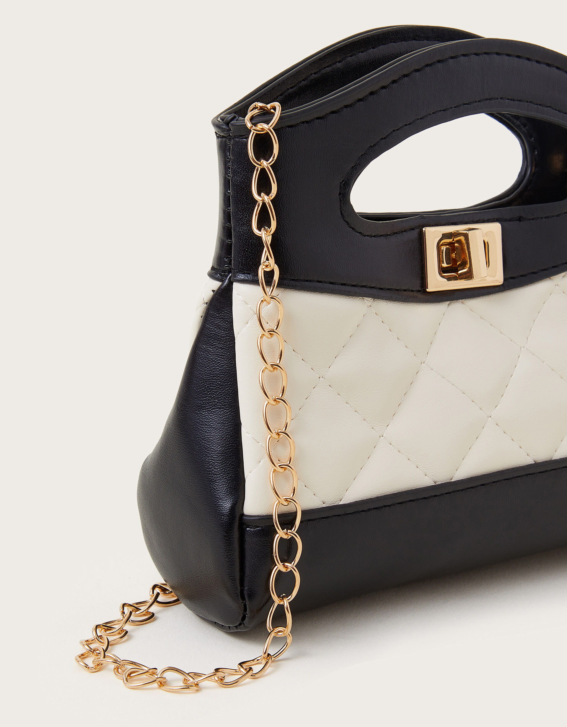 Monochrome Quilted Mini Bag | Accessories | Monsoon UK.