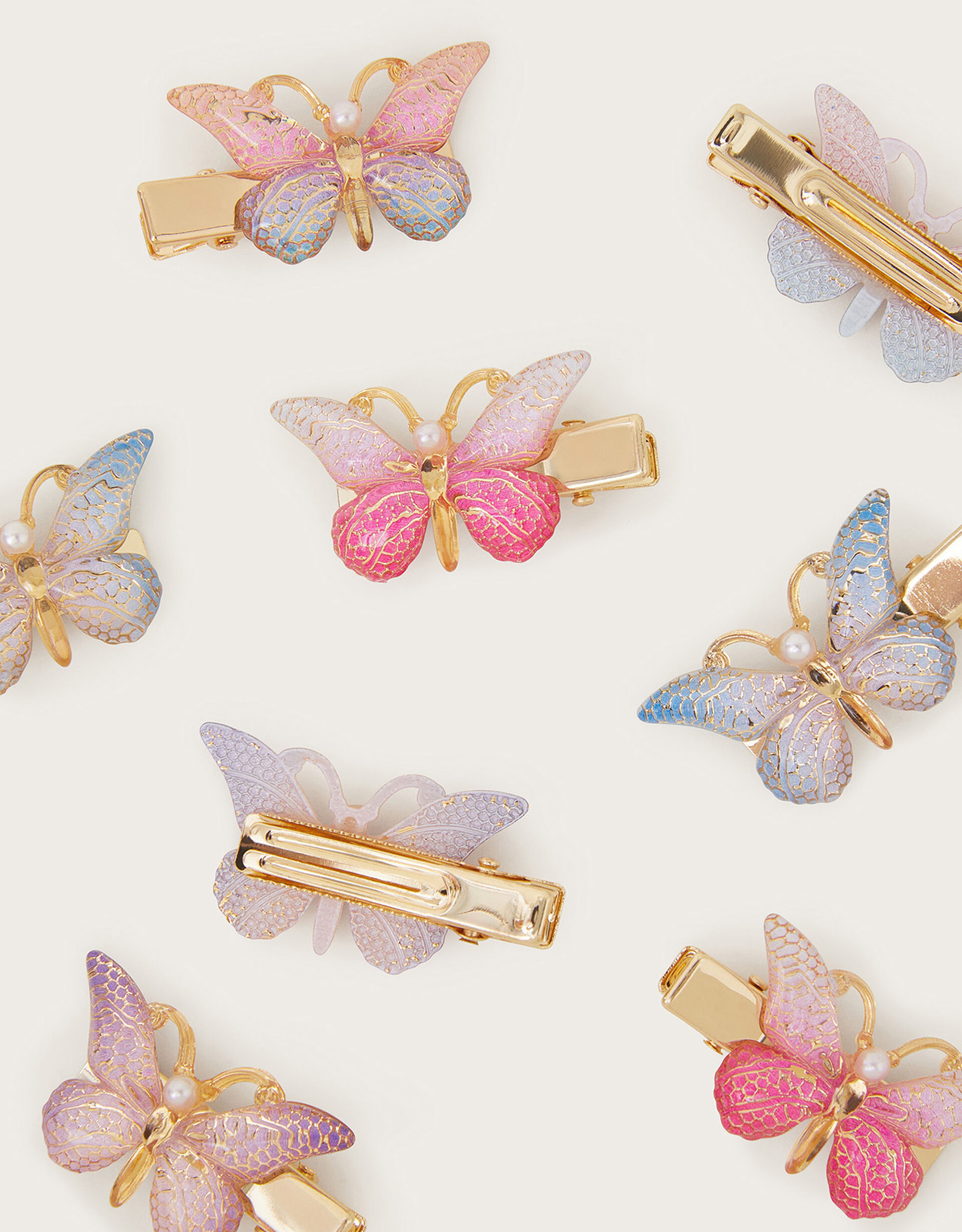 8-Pack Rainbow Butterfly Hair Clips | Accessories | Monsoon UK.