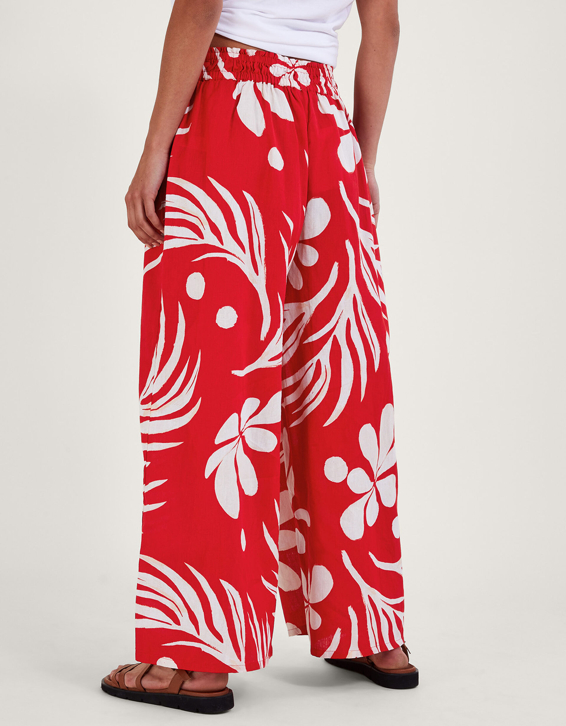 Wide Leg Palm Print Trousers Red | Beachwear & Swimwear | Monsoon UK.