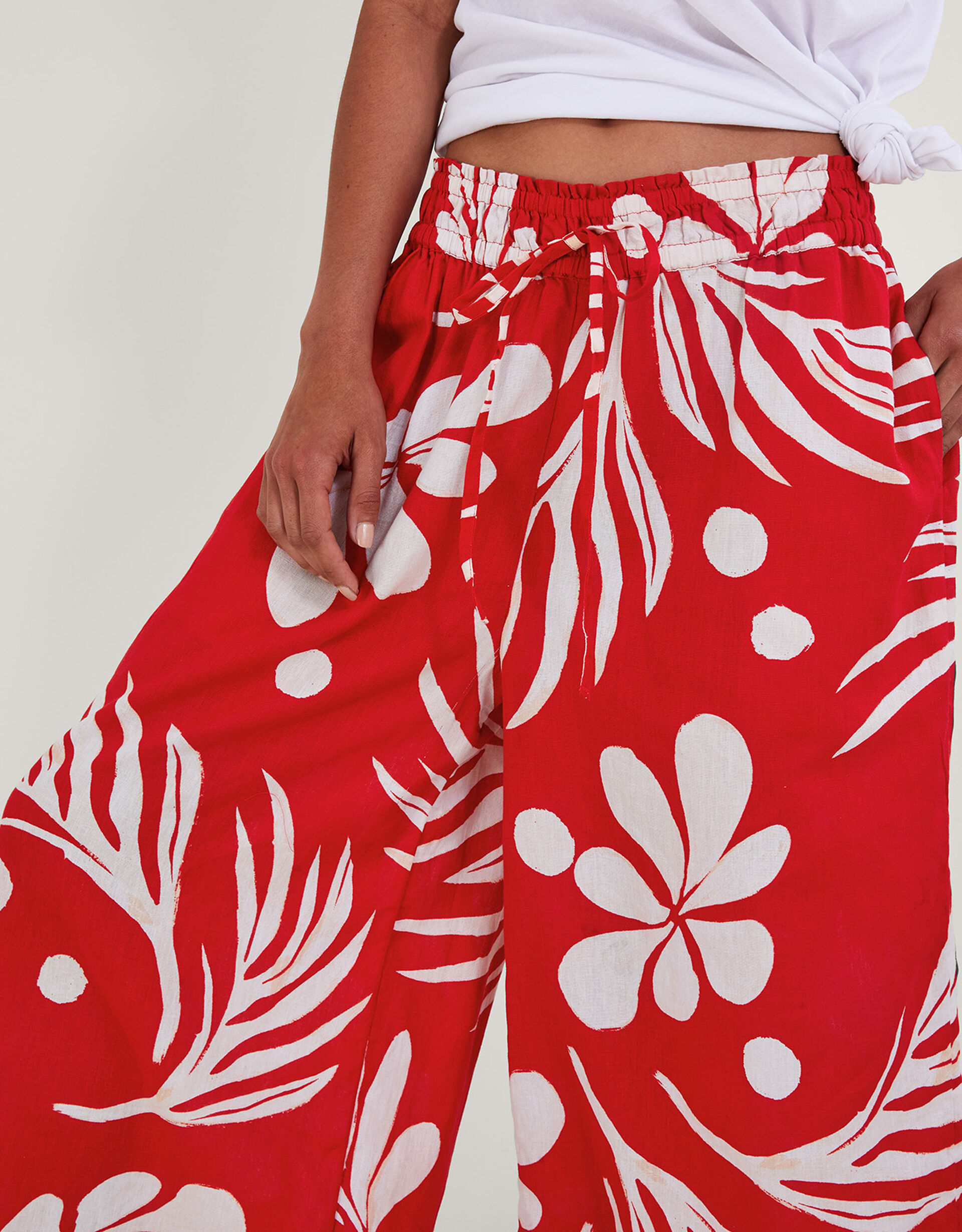 Wide Leg Palm Print Trousers Red | Beachwear & Swimwear | Monsoon UK.