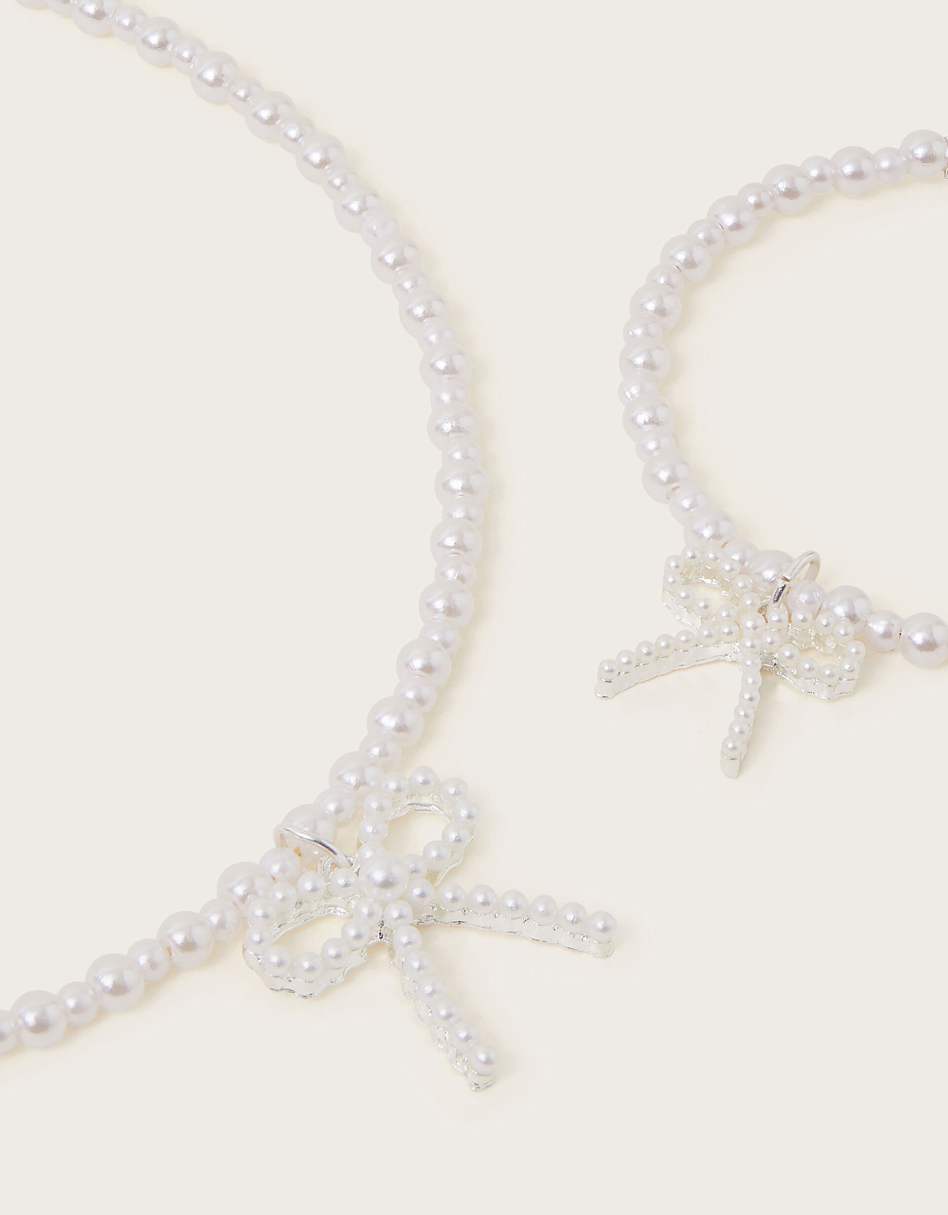 Pearl Bow Jewellery Set | Accessories | Monsoon UK.