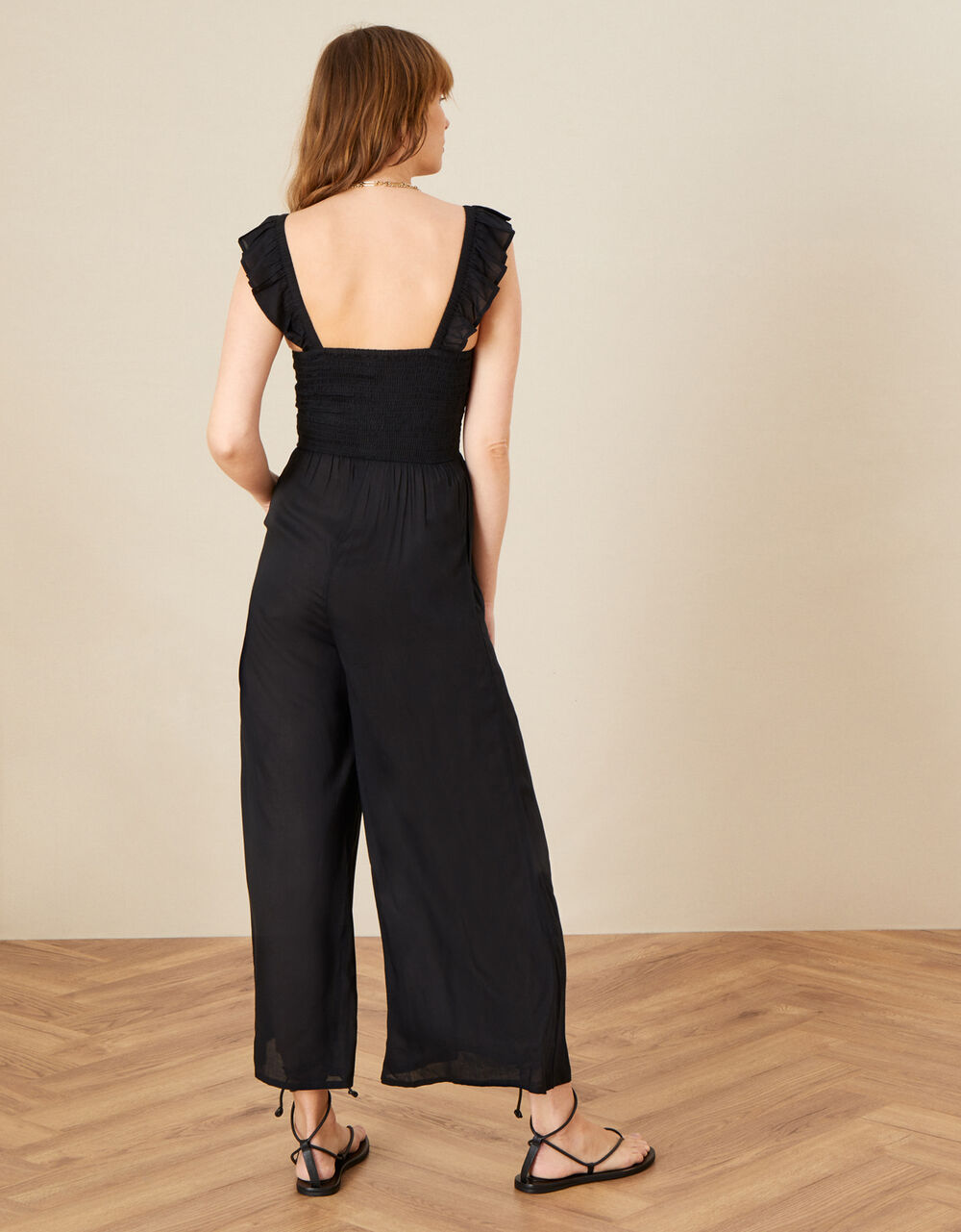 Plain Ruffle Jumpsuit in LENZING™ ECOVERO™ Black | Jumpsuits | Monsoon UK.